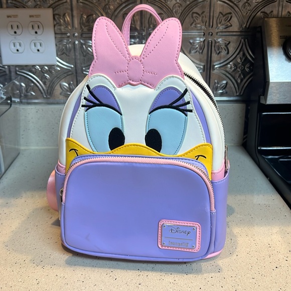 Loungefly | Bags | Rare Loungefly Daisy Duck Mini Backpack Pink And ...